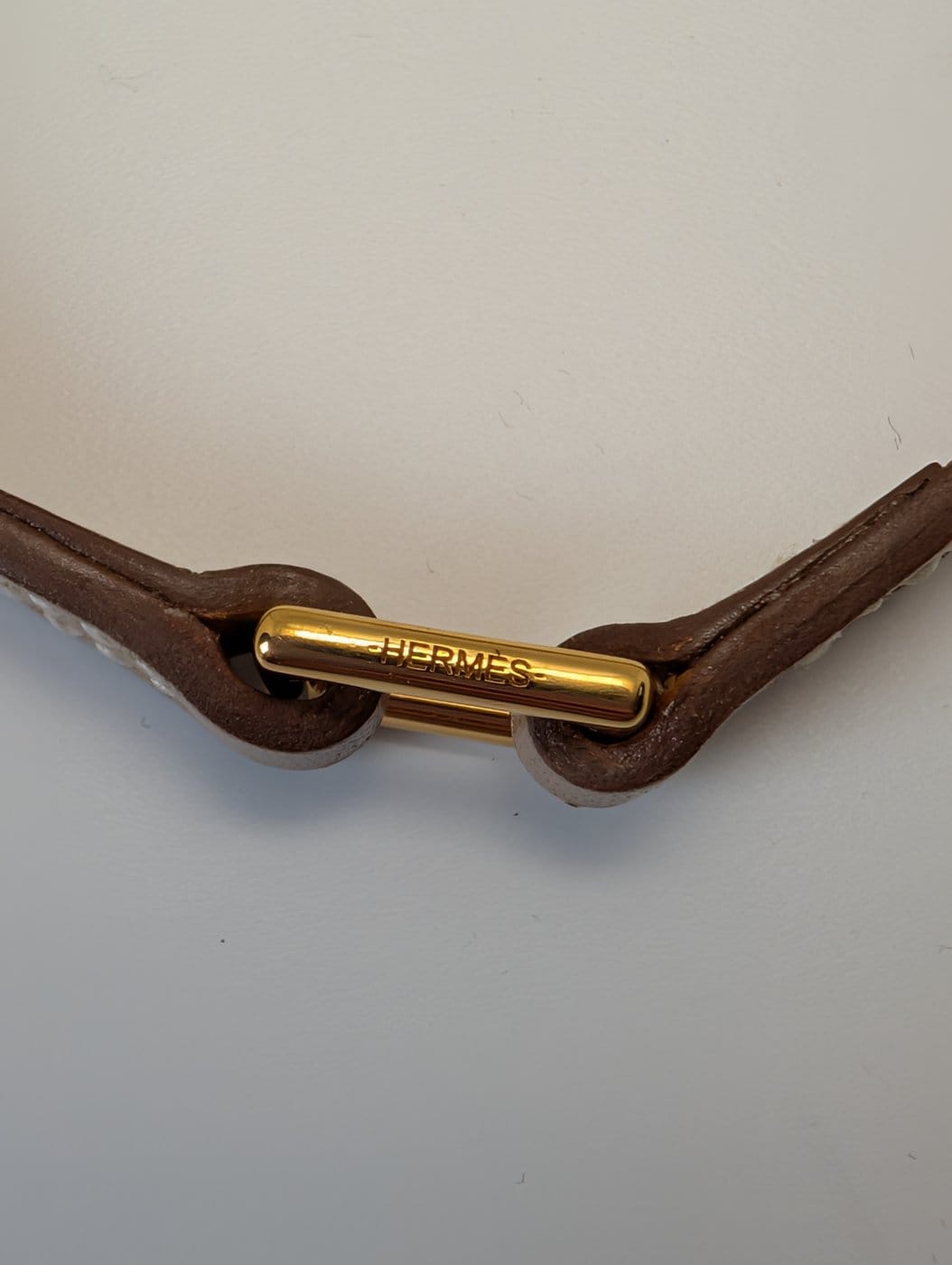 Hermès Kelly Mini - Pulsera de metal bañado en oro y cuero - 58 Facettes